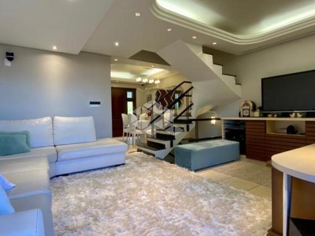 CASA EM CONDOMÍNIO FECHADO 03 DORMITÓRIOS E 2 VAGAS COM 171M² NO BAIRRO TRISTEZA