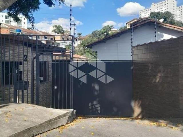 CASA EM CONDOMINIO FECHADO 2 DORMITORIOS NA VILA SANTOS