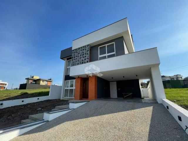 CASA EM CONDOMÍNIO FECHADO 3 DORMITÓRIOS