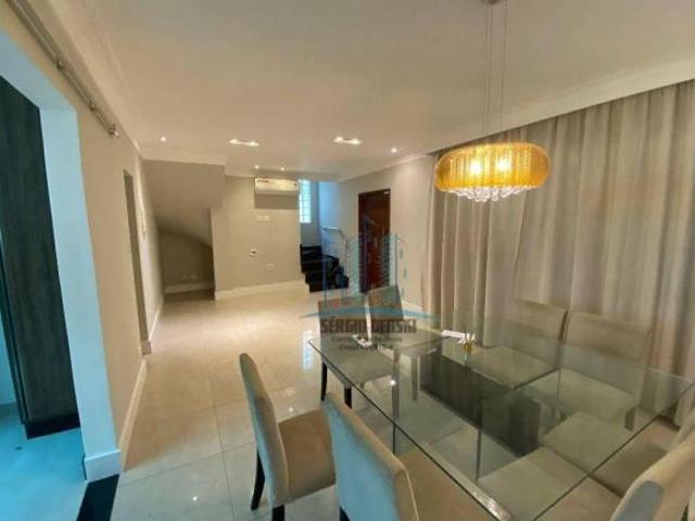 Casa em condomínio fechado, 3 suítes, cozinha americana.piscina. Santos/SP