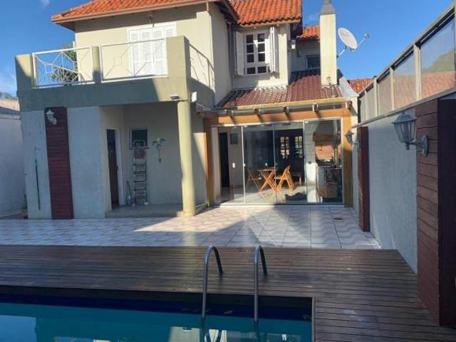 CASA EM CONDOMÍNIO FECHADO À VENDA COM 4 DORMITÓRIOS NO BAIRRO ESPÍRITO SANTO ? PORTO ALEGRE/RS