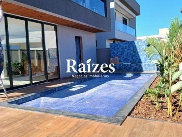 Casa em condomínio fechado à venda em Uberlândia com 4 suítes e área gourmet