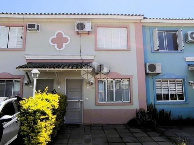 Casa em condomínio fechado com 3 dormitório, e 2 vagas de garagem no Bairro Humaita