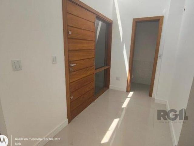 Casa em Condomínio fechado com 3 dormitórios no bairro Vila Nova em Porto Alegre, RS