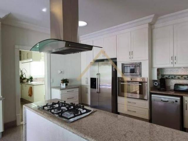 CASA EM CONDOMINIO FECHADO COM 3 SUÍTES PROXIMO AO HORTO EM AMERICANA/SP