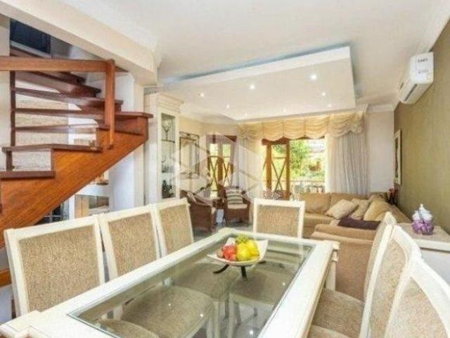 Casa em condomínio fechado com 255 m², 3 dormitórios e espaço gourmet completo