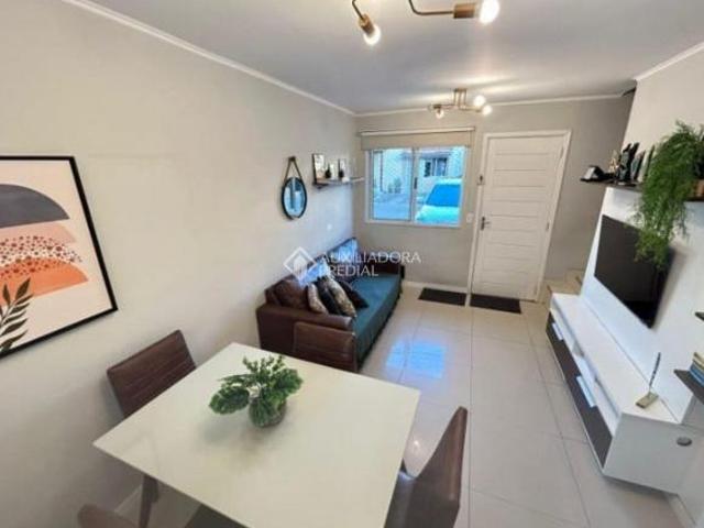 Casa em condomínio fechado com 2 dormitórios, área gourmet e lazer completo Canoas