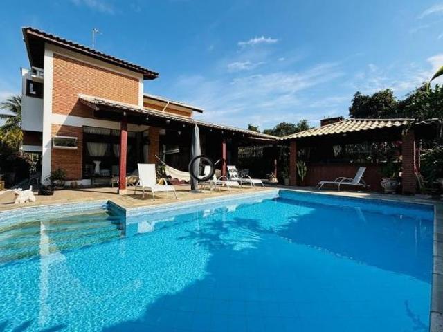 Casa em condominio fechado com 4 suites no guaruja