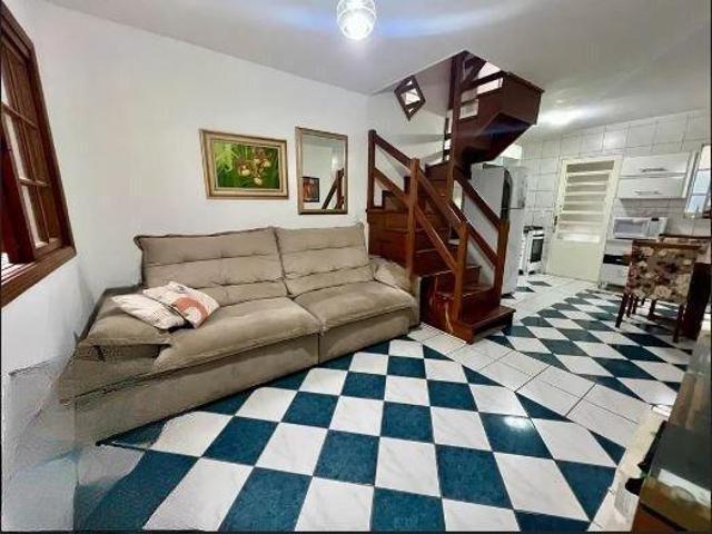 Casa em condomínio fechado com 94m2, 3 dormitórios no bairro Camaqu