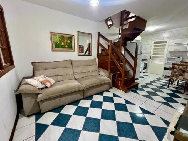 Casa em condomínio fechado com 94m2, 3 dormitórios no bairro Camaquã