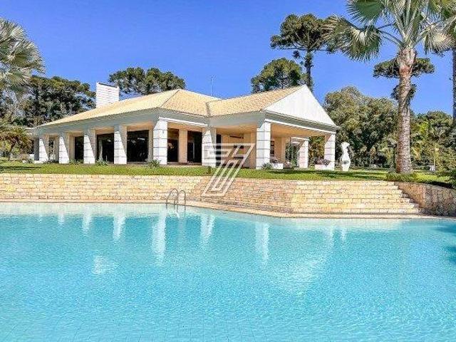 CASA EM CONDOMINIO FECHADO COM PISCINA TERRENO DE 18 MIL M²