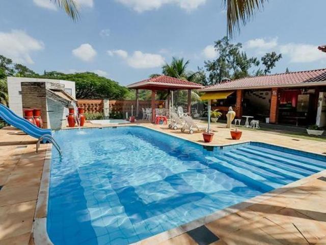Casa em condomínio fechado com piscina lindo jardim área gourmet e muito mais, agende sua visita e v