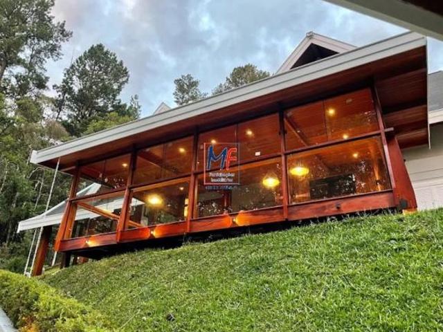 Casa em condomínio fechado no Alto do Capivari, com 400 m² a.u 1.080 m² terreno, 5 suítes e 4 vag