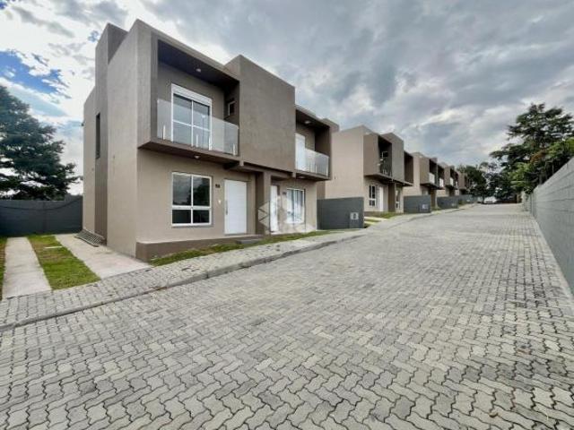 Casa em condomínio fechado no bairro São José em Santa Maria