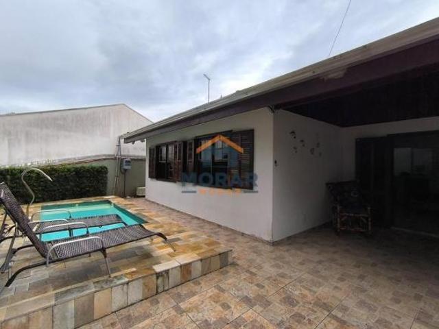 CASA EM CONDOMÍNIO FECHADO NO BALNEÁRIO CANOAS