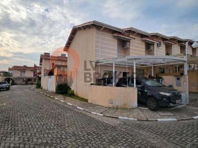 CASA EM CONDOMINIO FECHADO 2 DORMITÓRIOS 2 VAGAS