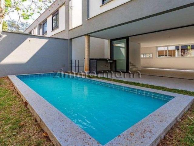 CASA EM CONDOMÍNIO FECHADO SANTO AMARO 4 SUÍTES 4 VAGAS