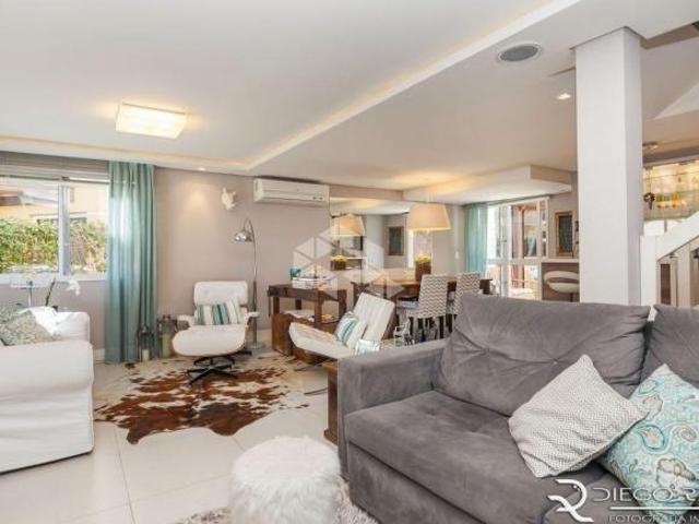 Casa em Condomínio fechado semi mobiliada com 322m² privativos bairro Mário Quintana