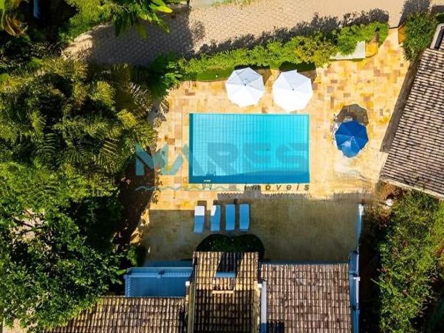 Casa em condomínio frente ao mar