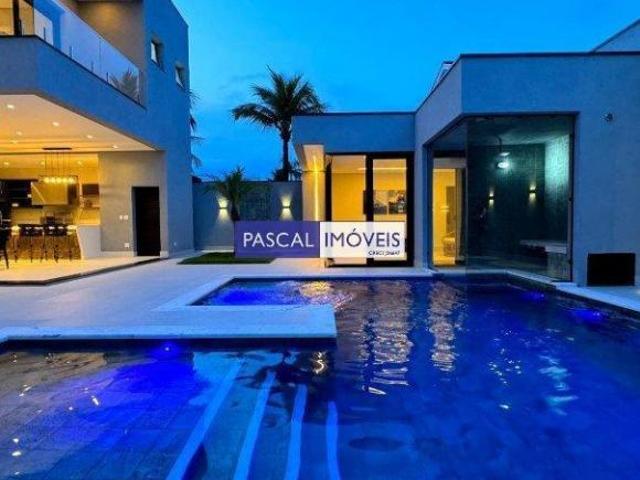 Casa em condomínio Jardim Acapulco 5 Suítes