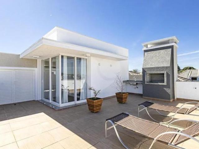 Casa em condomínio no coração de Santa Felicidade · 346,48 m²