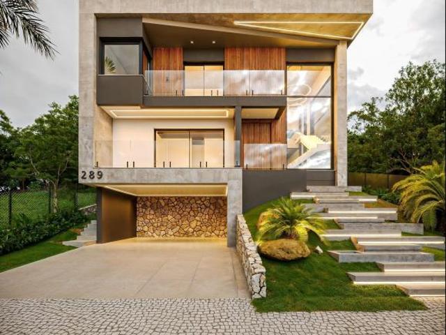 Casa em condomínio no Alphaville com 4 suítes e área gourmet