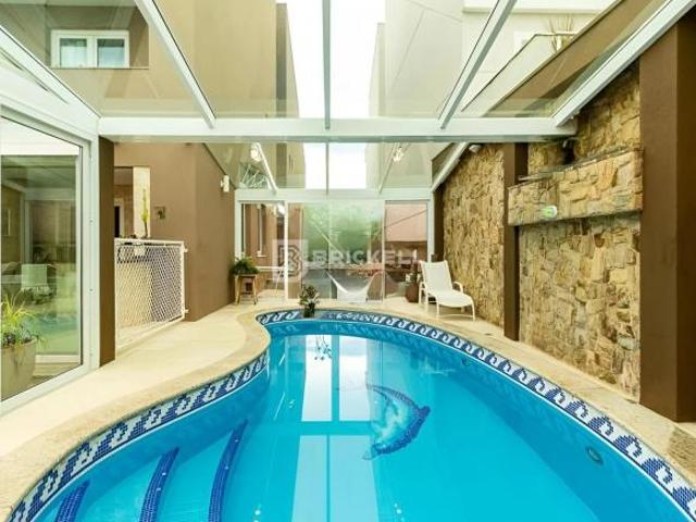 Casa em Condomínio no Bacacheri, 4 Suítes, 515m² à Venda