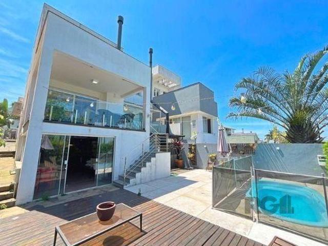 Casa em condomínio no bairro Aberta dos Morros, com 3 dormitório s