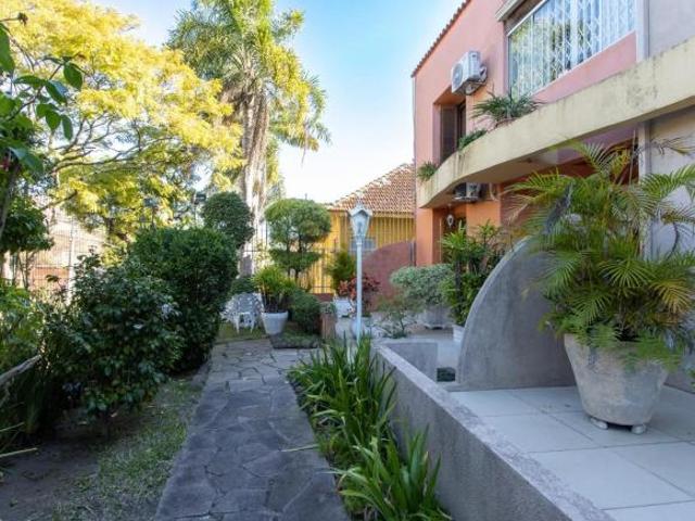 CASA EM CONDOMÍNIO NO BAIRRO IPANEMA — 4 DORMITÓRIOS 2 SUÍTES — 2 VAGAS