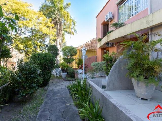 CASA EM CONDOMÍNIO NO BAIRRO IPANEMA — 4 DORMITÓRIOS 2 SUÍTES — 2 VAGAS