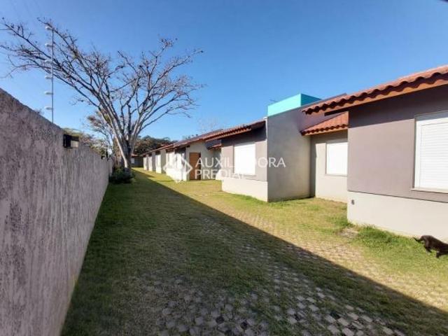 Casa em condomínio no bairro Ponta Grossa