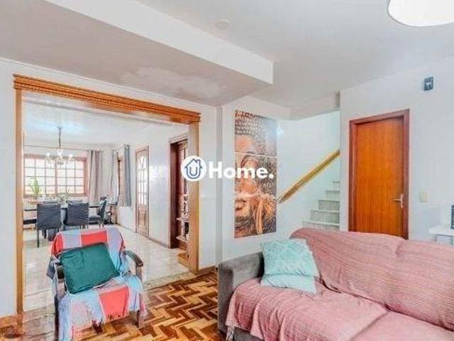 Casa em condomínio no bairro Santo Antômnio de 4 dormitórios e 2 vagas