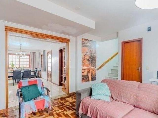 Casa em condomínio no bairro Santo Antômnio de 4 dormitórios e 2 vagas