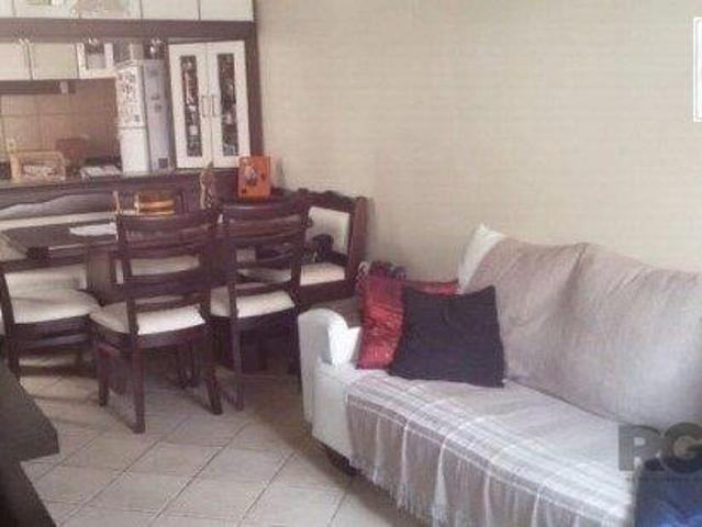 Casa em condomínio no Partenon de 3 dormitórios e vaga