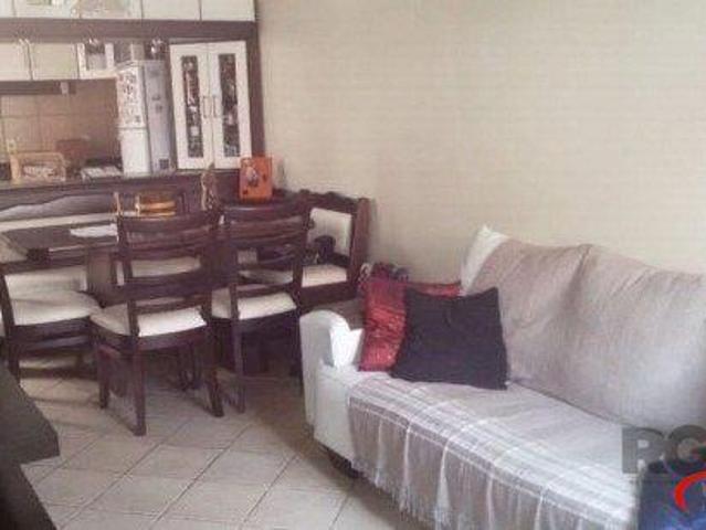 Casa em condomínio no Partenon de 3 dormitórios e vaga