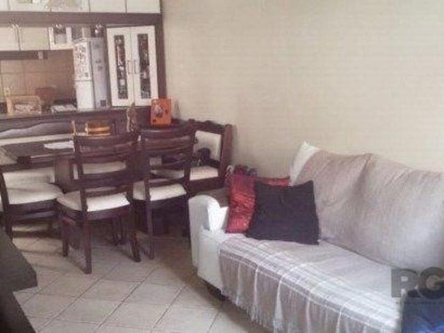 Casa em condomínio no Partenon de 3 dormitórios e vaga