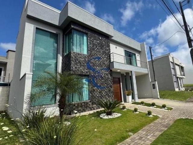 Casa em condomínio no Umbará