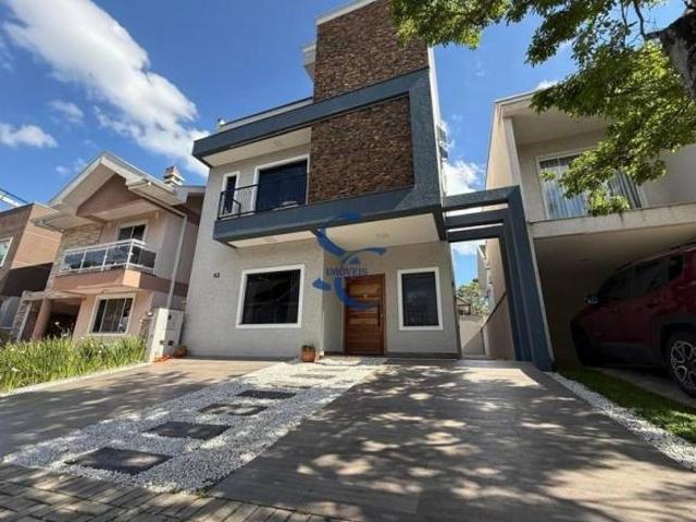 Casa em condomínio no Umbará