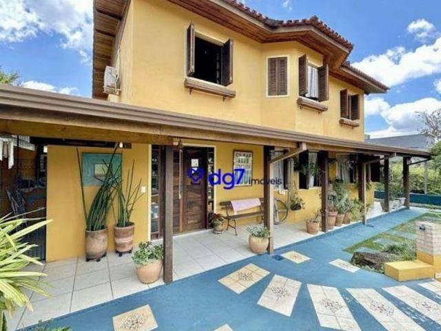 Casa em condomínio na Nova Higienopolis com 3 dormitórios e 2 vagas!