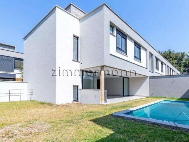 CASA EM CONDOMINIO SANTO AMARO 4 SUITES 4 VAGAS