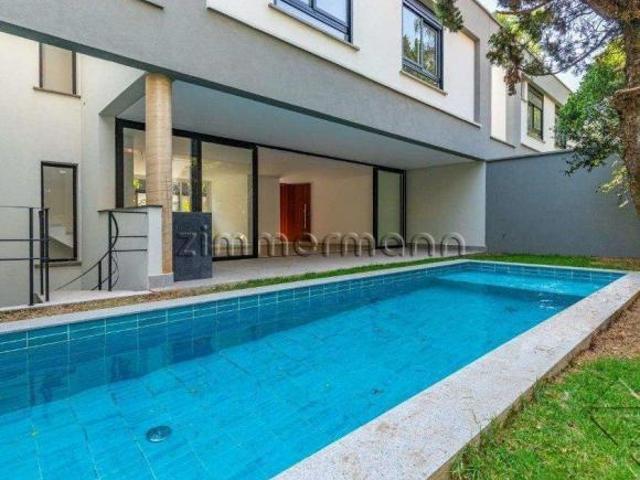 CASA EM CONDOMINIO SANTO AMARO 4 SUÍTES 4 VAGAS