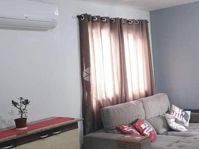 Casa em condominio, semimobiliada, 3 dormitórios, duas vagas de garagem, pátio fundos com churrasque