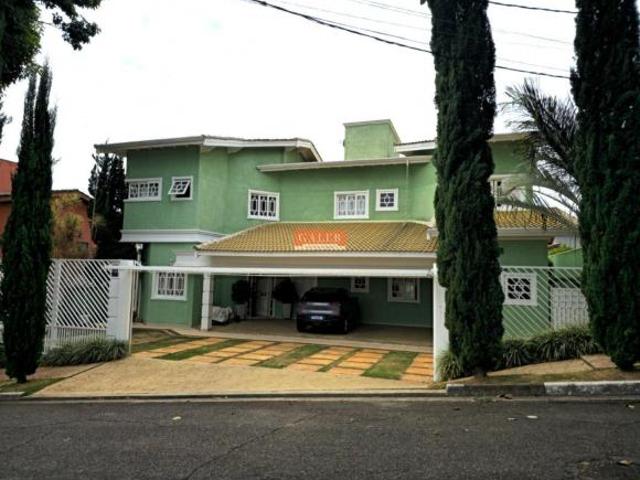 Casa em condomínio Shamballa com adega, piscina e espaço gourmet, tudo num terreno de 800m²!