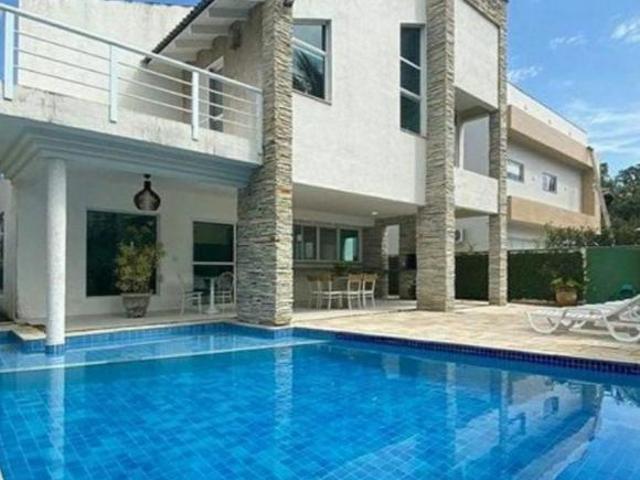 Casa em condomínio para venda com 4 quartos, sendo 2 suítes, 290m²