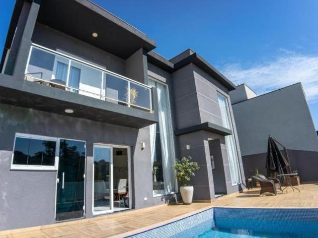 Casa em condomínio para venda com 4 quartos, sendo 4 suítes, 320m²