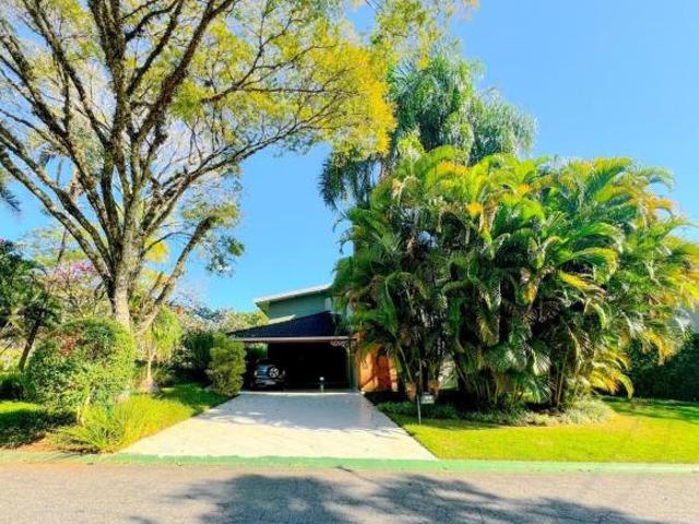Casa em condomínio para venda com 4 quartos, 458m²