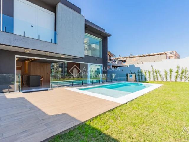 Casa em condomínio para venda com 4 suítes em Vila Nova