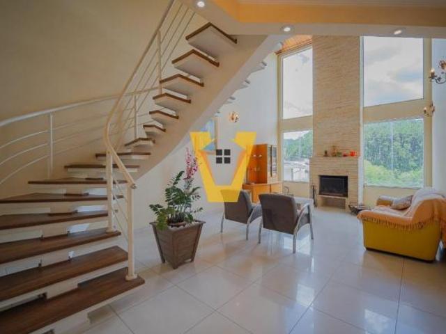 Casa em condomínio para venda com 5 quartos, sendo 5 suítes, 395m²