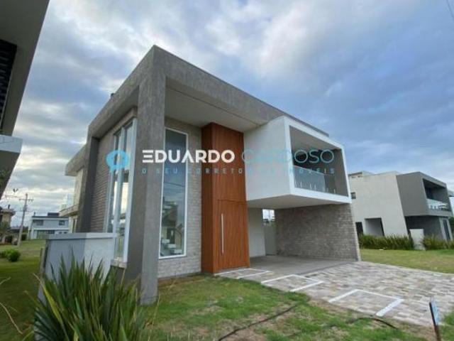 Casa em Condomínio para Venda em Capão da Canoa, Curumim, 4 dormitórios, 4 suítes, 5 banheiros, 2 va