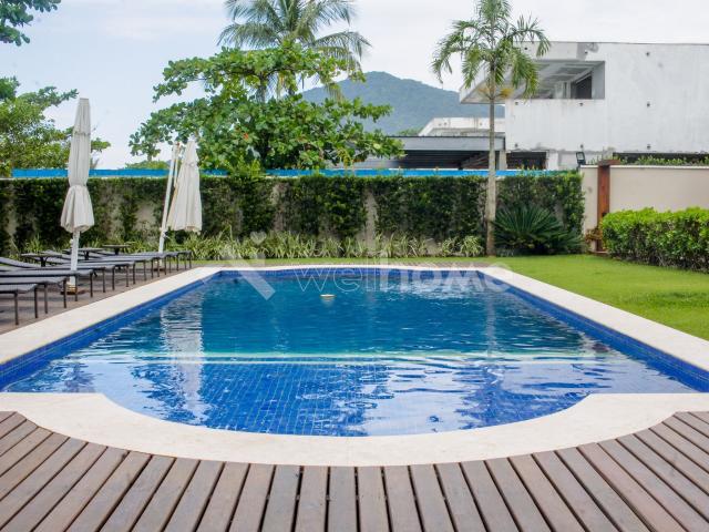 Casa em condomínio pé na areia Maresias
